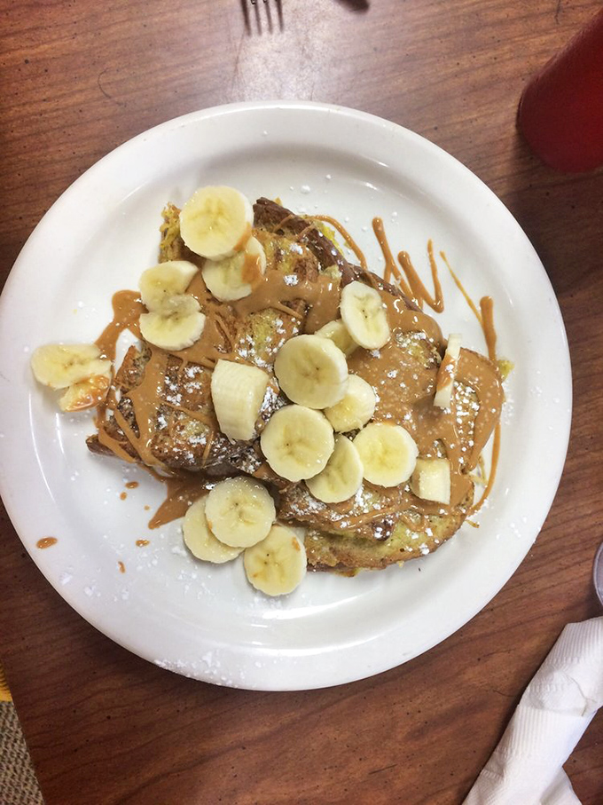 French toast that would make even the snootiest Parisian say "Ooh la la!" Breakfast alchemy at its finest, turning bread into gold.