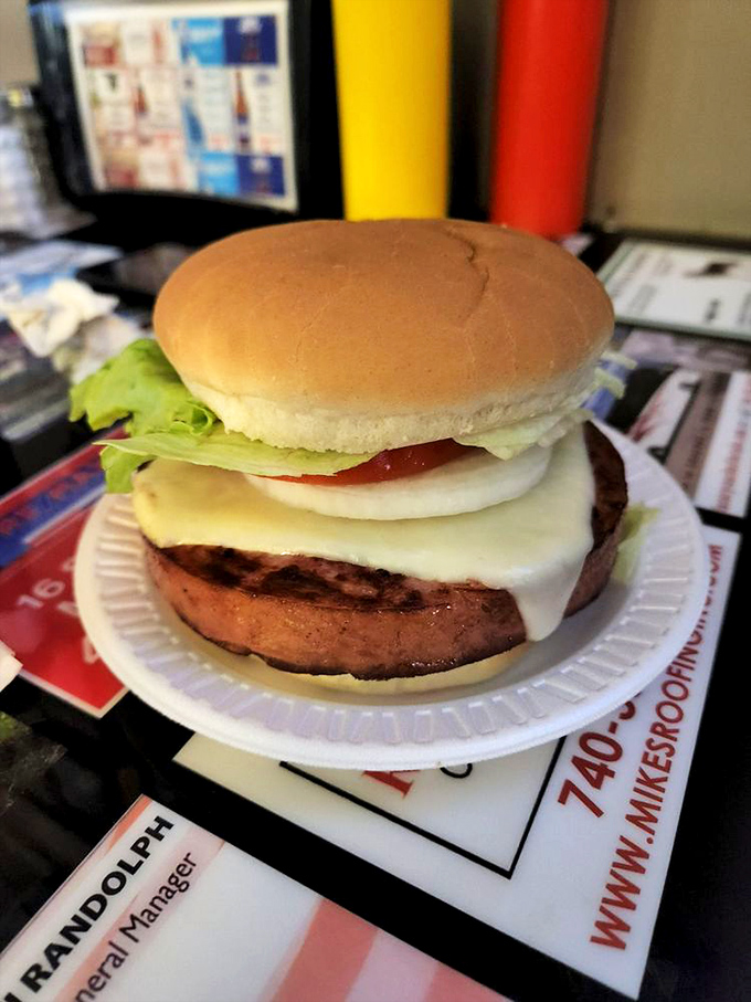 The famous fried bologna sandwich—proof that childhood nostalgia can be improved upon with a hot griddle and some serious know-how.
