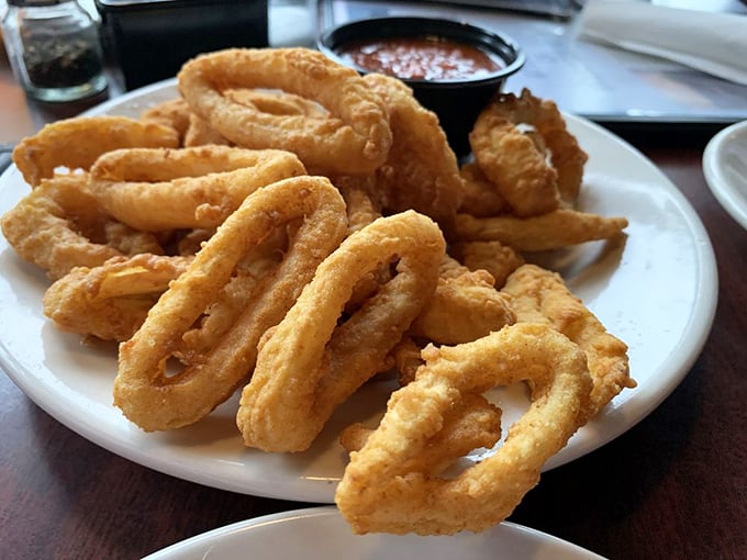 Calamari or modern art? These golden rings are a crispy, delicious homage to the wonders of the sea.