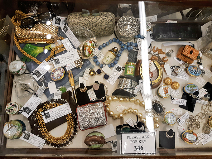 Treasure chest alert! This jewelry case is a glittering galaxy of bygone bling, where every piece tells a story of fashion, romance, and occasional questionable taste.