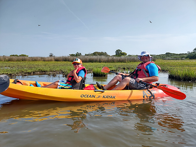 Kayaking the serene waters near Assateague offers peaceful moments with nature and the chance to build arm muscles you didn't know existed.