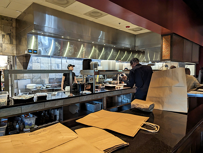 Peek behind the culinary curtain! These kitchen wizards are cooking up magic faster than you can say "medium-rare, please."