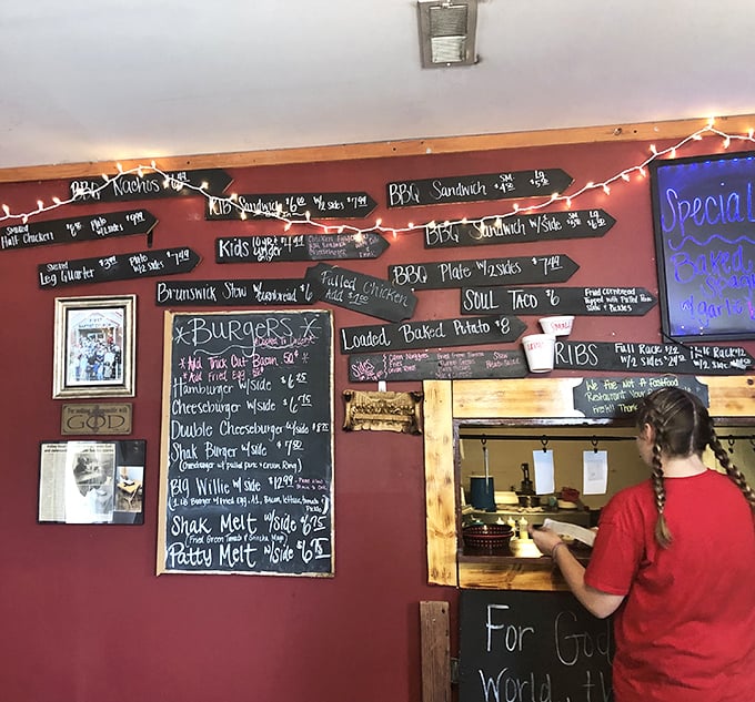 Where the magic happens! This kitchen area is like backstage at a rock concert, but instead of guitars, they're shredding pork.