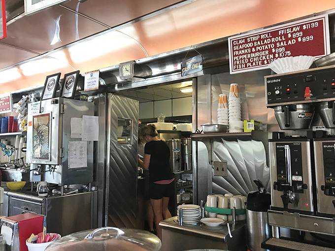 Where the magic happens! This bustling kitchen is like a well-oiled machine, churning out comfort food faster than you can say "Adam and Eve on a raft!"
