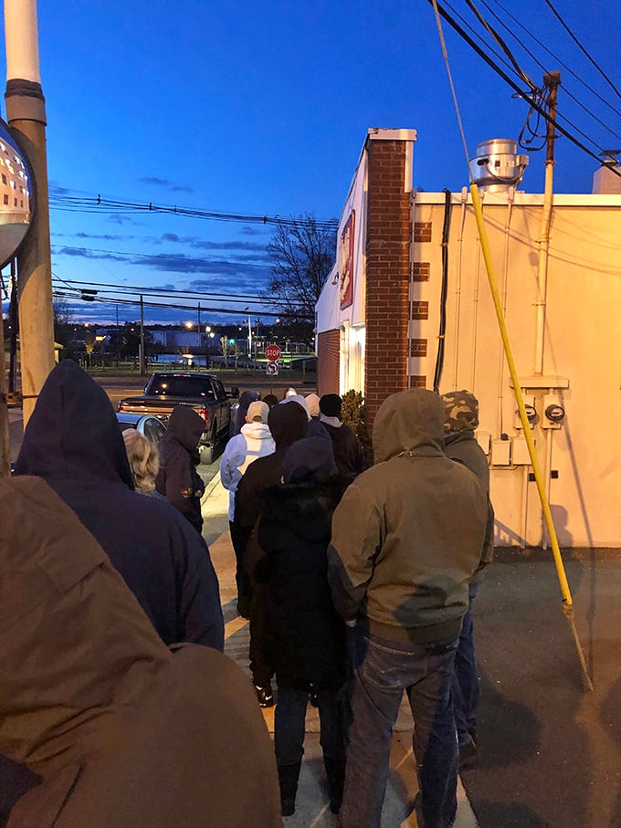 Donut devotees unite! This line of patient patrons proves that good things come to those who wait (for donuts).