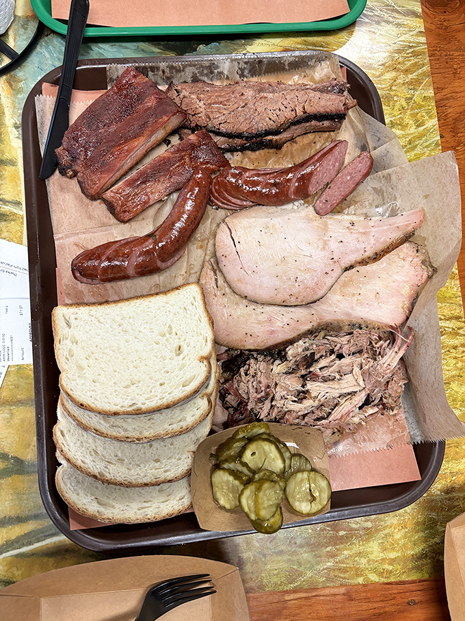 The Mount Rushmore of meats! This platter is a carnivore's dream team, featuring an all-star lineup of smoky delights.