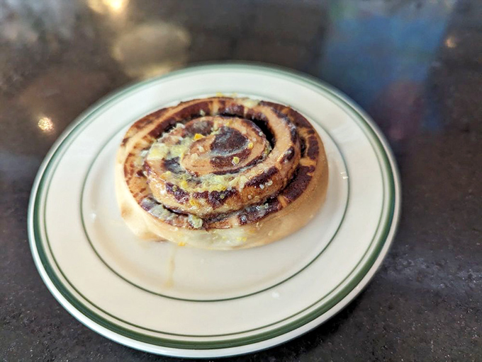 A cinnamon roll that's ready for its close-up. This swirly treat looks like it could star in its own breakfast cereal commercial.