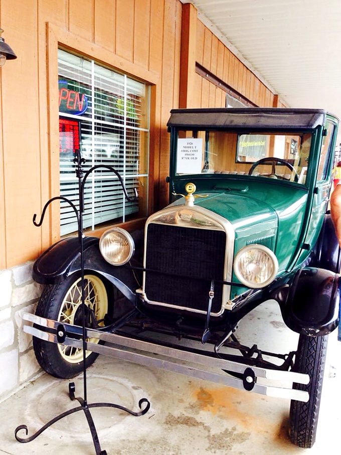 An antique Ford Model T greets visitors, reminding us of a time when both cars and food were built to satisfy rather than impress.