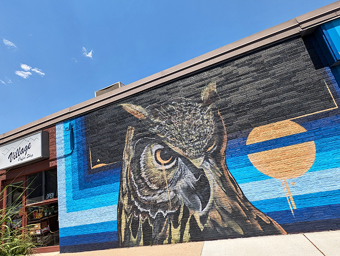 Who says owls aren't early birds? This mural watches over the Village Coffee Shop, ensuring only the wisest breakfast decisions are made.
