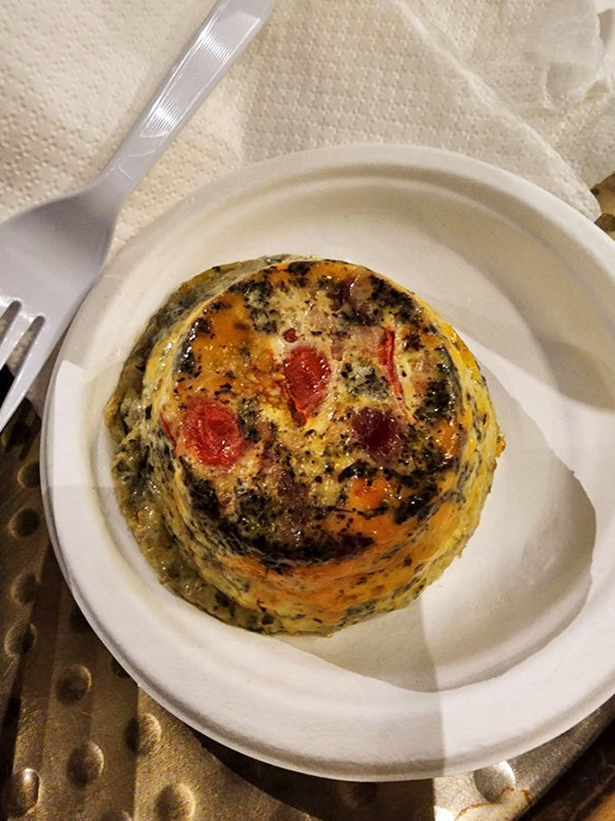 This quiche is ready for its close-up, Mr. DeMille. A star-studded cast of eggs, veggies, and cheese in a flaky crust.