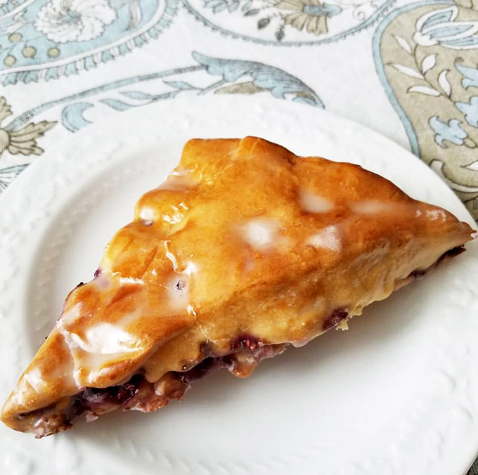 This fruit-filled pastry isn't just breakfast - it's a morning masterpiece with a sweet-tart raspberry surprise.