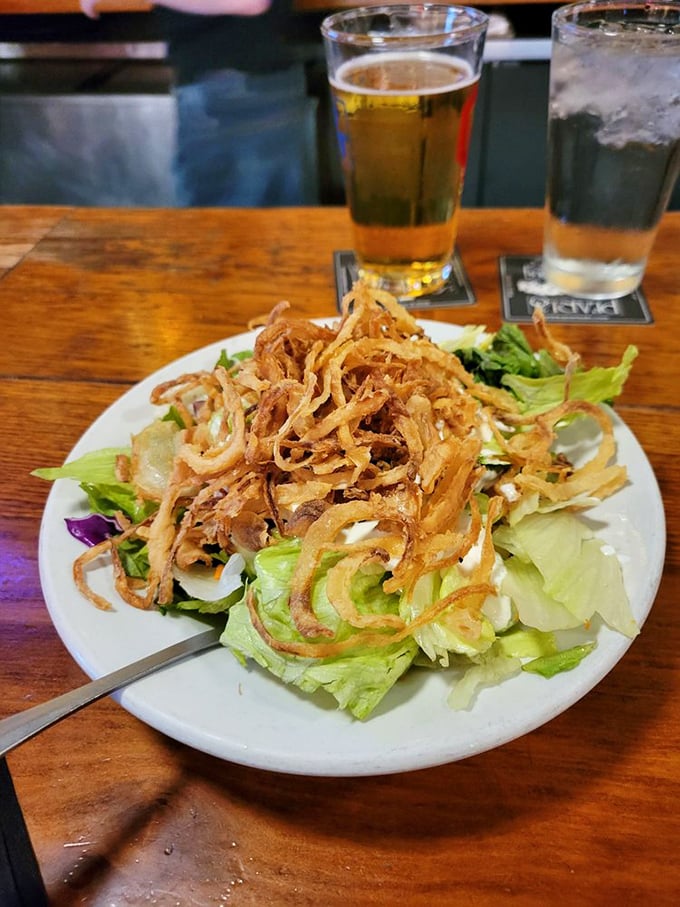 Who said salads were boring? This crunchy creation is topped with enough crispy onions to make a French chef weep with joy.