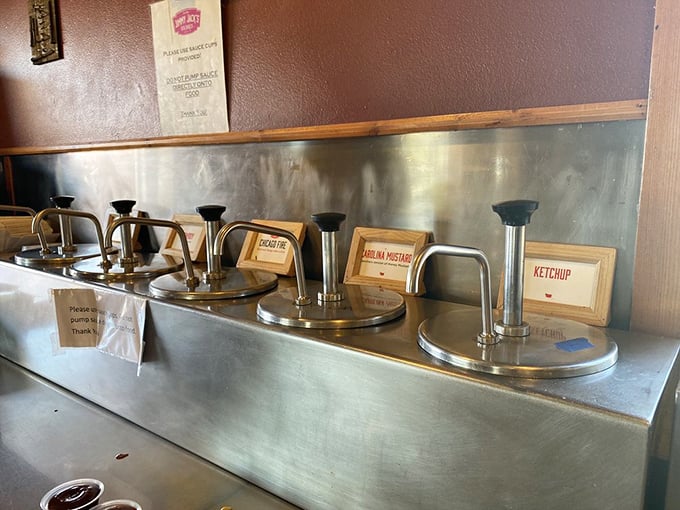 Condiment heaven! This sauce station is where barbecue dreams are seasoned to perfection. It's like a flavor DJ booth, ready to drop some tasty beats.