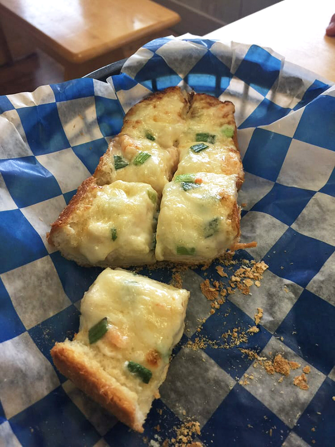 Cheesy does it! This shrimp bread looks like the lovechild of garlic bread and a seafood buffet. Carb lovers, rejoice!