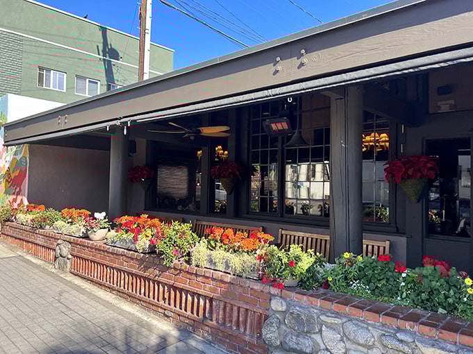 Flower power! The Kettle's exterior blooms with colorful charm, proving that sometimes the appetizer for a great meal is feasting your eyes first.