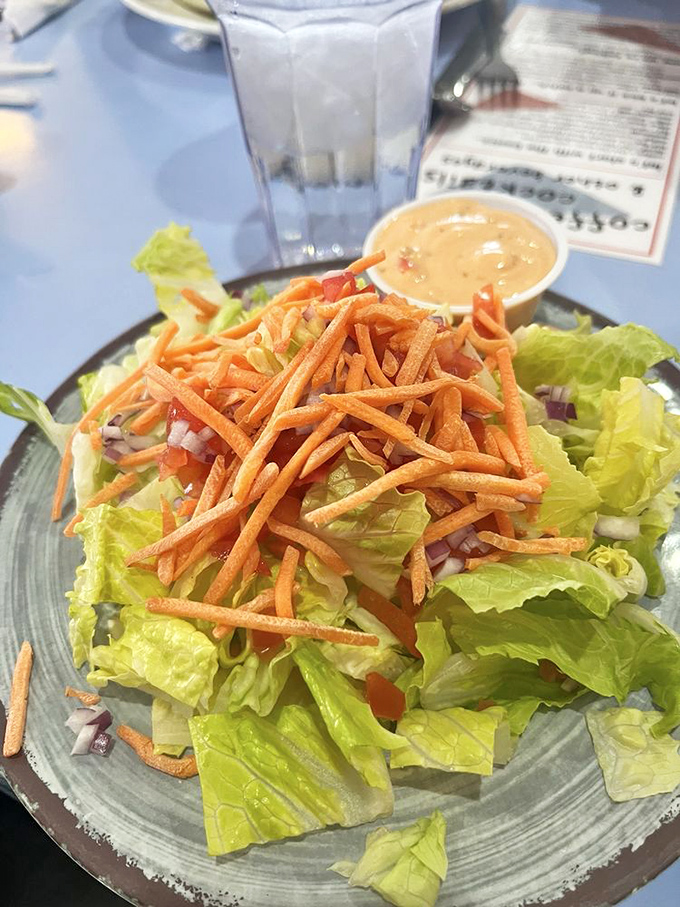 Not just a side salad, but a crunchy carnival of freshness! These crisp veggies are doing a happy dance, waiting to leap onto your fork.
