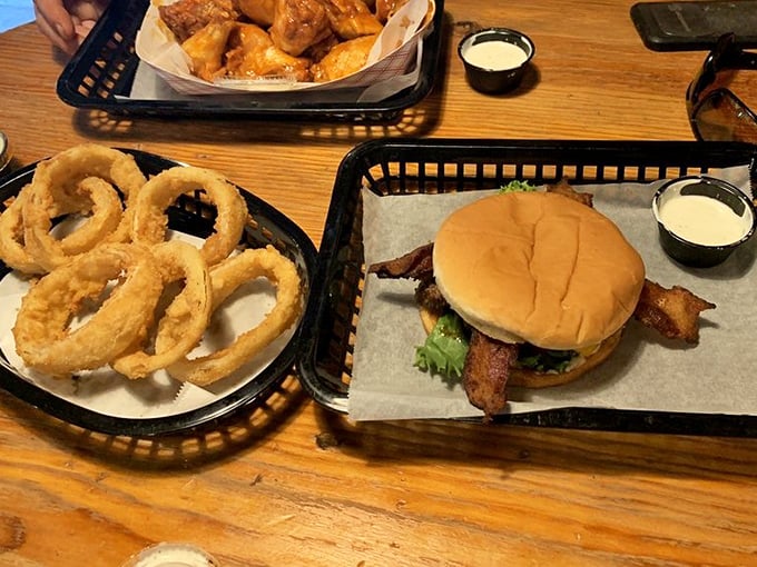 A burger and onion rings that would make any cardiologist wince and any food lover smile. Worth every minute on the treadmill tomorrow.
