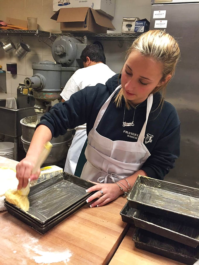 Behind the scenes, where the magic happens. These bakers are the unsung heroes of your morning sugar rush.