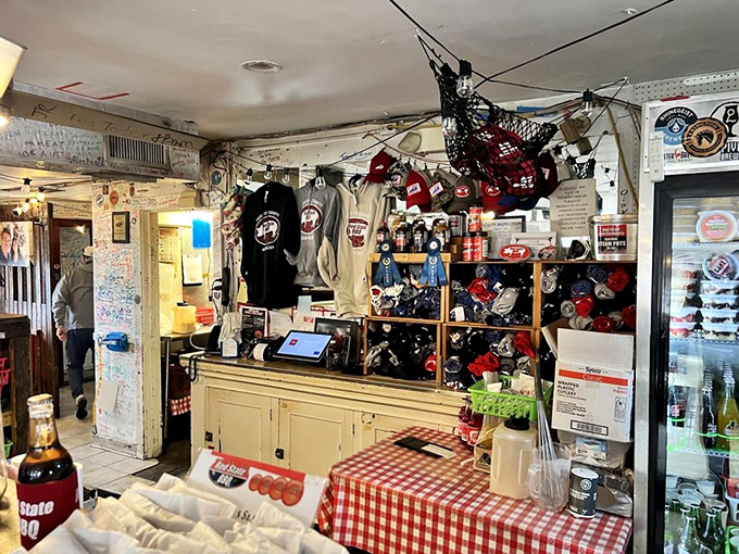 Barbecue swag central! From sauces to shirts, this corner is a treasure trove for BBQ enthusiasts. It's like a souvenir shop for your taste buds!