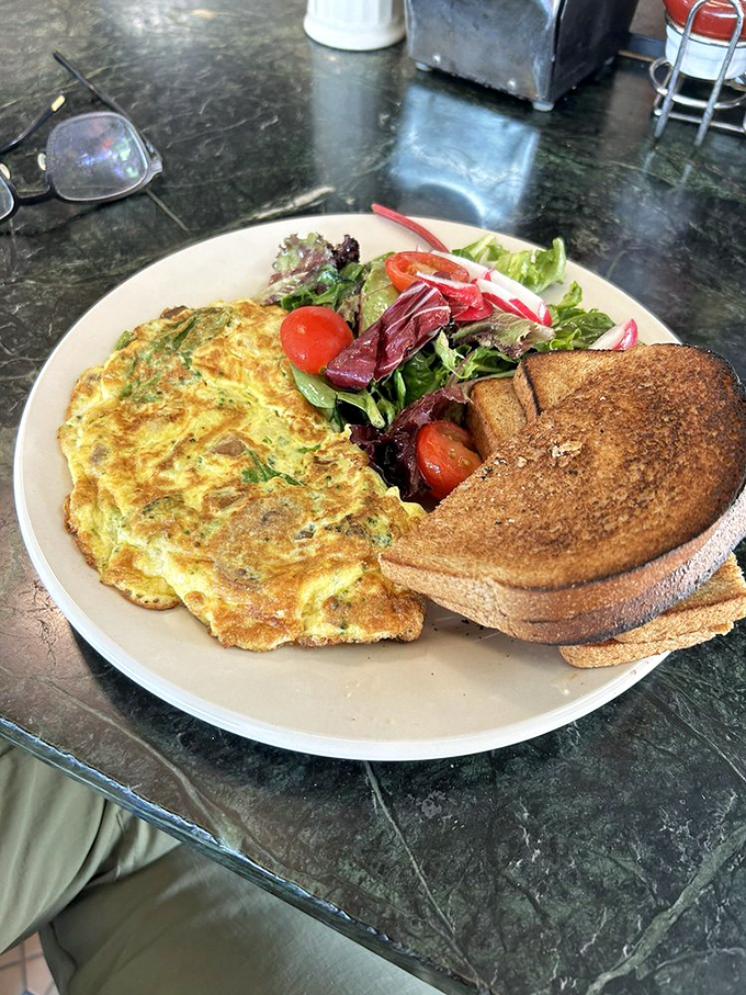 This veggie omelet doesn't apologize for being healthy&mdash;it's too busy showing off its perfect fold and vibrant garden fillings.