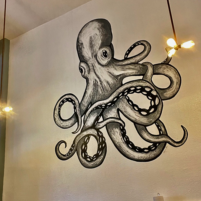Who knew cephalopods could be so artistic? This octopus mural adds a touch of whimsy to your dining experience.