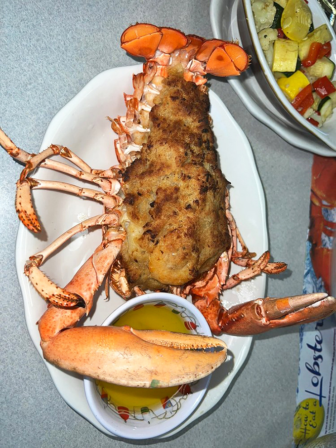 A baked lobster so perfectly golden, it could win a beauty pageant. Seafood indulgence at its finest.
