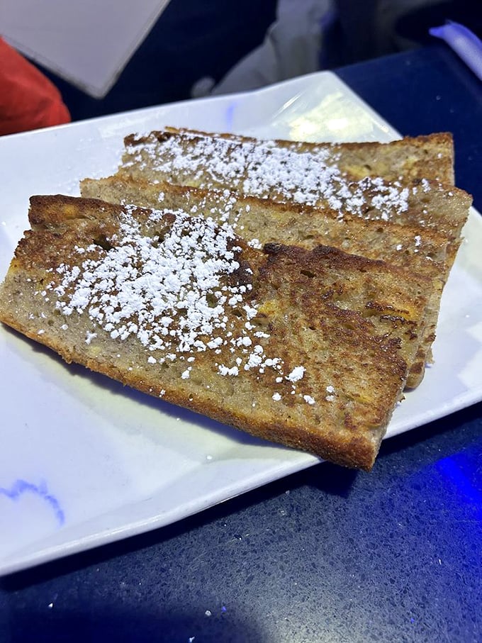 Toast that's been promoted to dessert status. It's not just bread; it's a sweet, cinnamony hug for your mouth.
