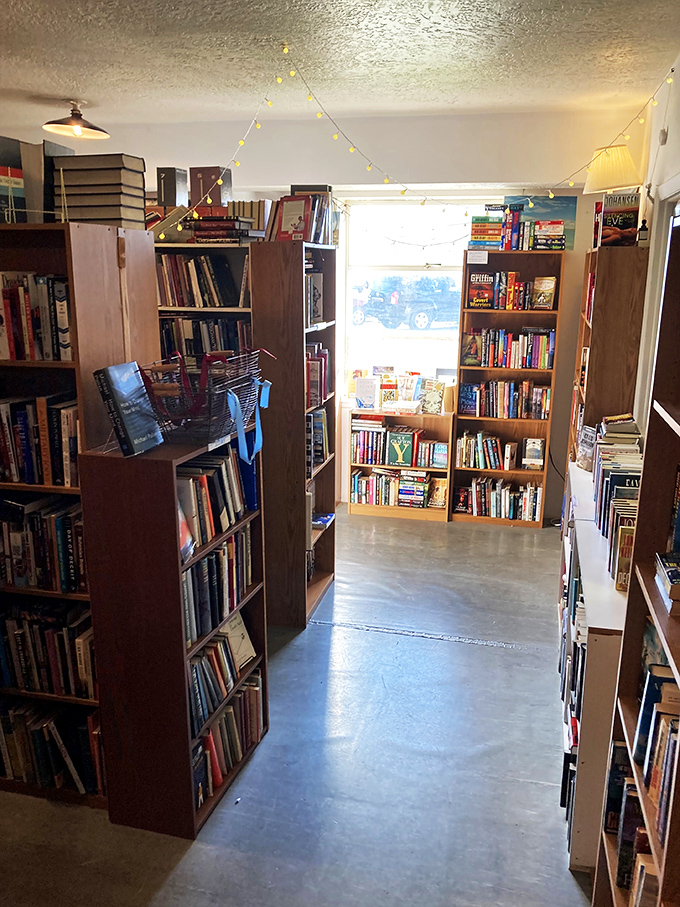 Floor-to-ceiling shelves that would make even the Beast's library jealous. Beauty and the Bookworm, anyone?
