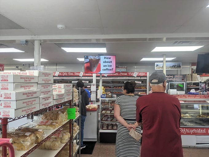 The happiest place on Earth! These customers know the secret to happiness - it's spelled H-O-L-L-A-N-D F-A-R-M-S. The smiles are as sweet as the treats.