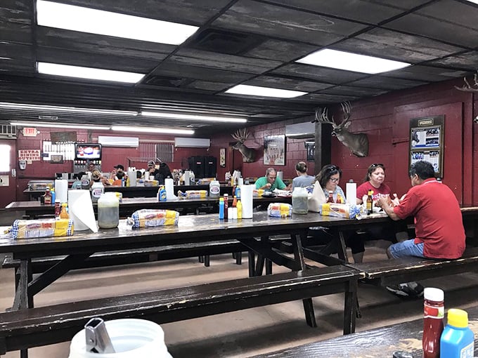 A feast for the senses! Happy diners dig into their trays of smoky goodness, proving that at Cooper's, every meal is a celebration.