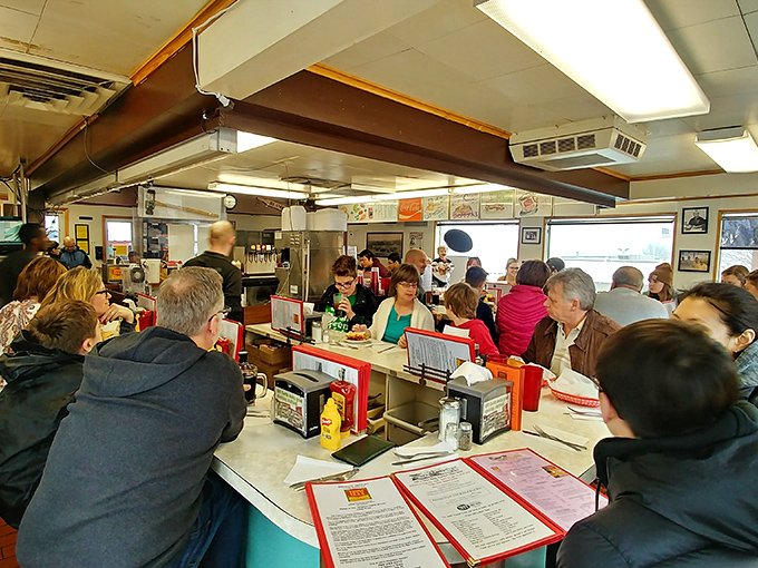 A slice of Americana, served fresh daily! This bustling diner scene could be straight out of a Norman Rockwell painting.