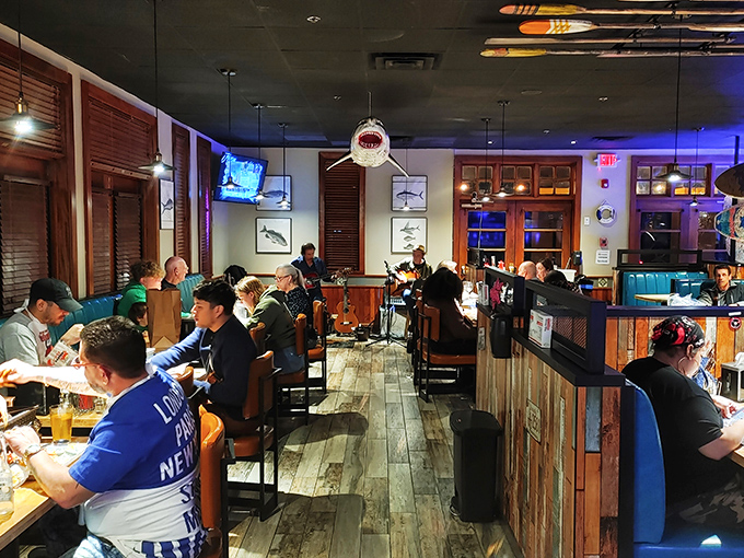 "Happy diners, shark decor, and seafood galore. It's like 'Jaws,' but with a much happier ending!"