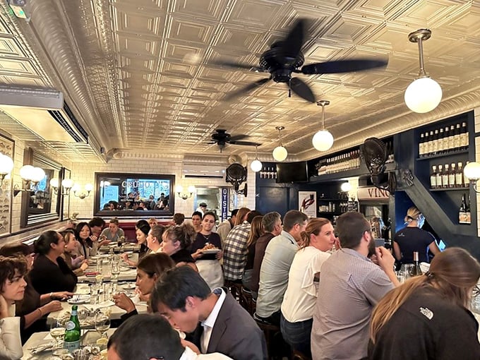 Seafood symphony in action: A bustling dining room where happy chatter mingles with the clinking of shells and glasses.