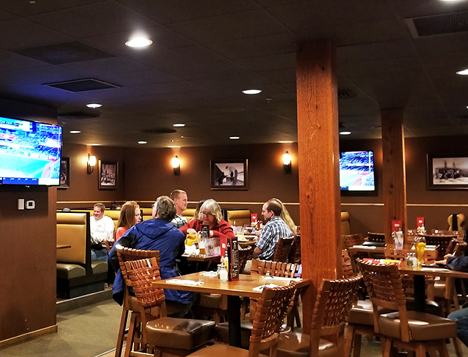 Happy diners in their natural habitat. Notice the satisfied smiles and the telltale signs of loosened belts.