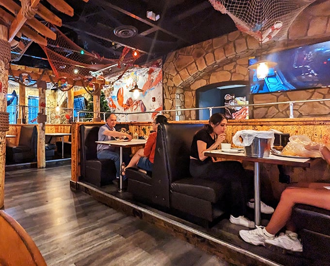 Happy diners diving into their seafood feasts. It's like a scene from "The Little Mermaid," if Ariel had an all-you-can-eat buffet.