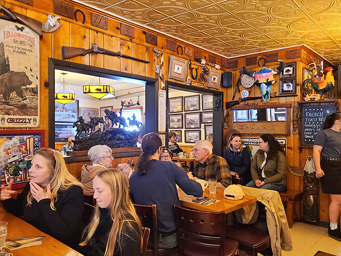 Breakfast club in session! This lively scene of diners proves that good food brings people together better than any social media app ever could.