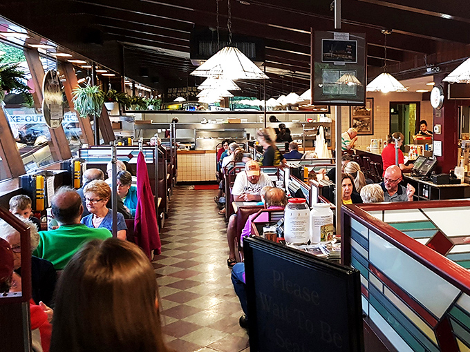 Happy diners, sizzling grills, and the promise of a great meal &ndash; it's like a Norman Rockwell painting come to life, with extra fries.