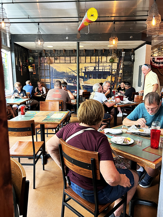 A full house of happy diners, all united in their quest for seafood nirvana. Can you smell what the chef is cooking?