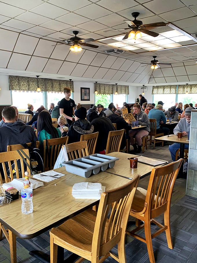 A full house of happy diners—proof that good food brings people together better than any Thanksgiving football game.