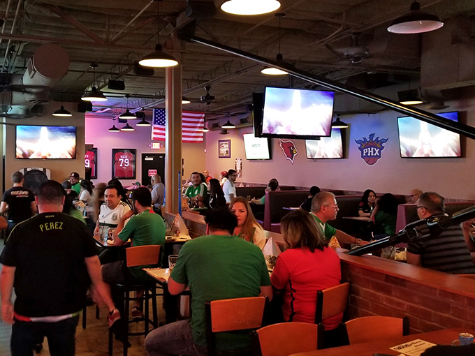 The scene of culinary crimes in progress. Watch as innocent wings disappear faster than you can say "extra napkins, please!"