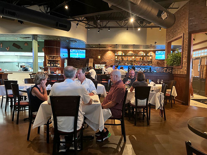 Good food, great company &ndash; that's what dining out is all about. These happy diners are living proof that Copper & Vine delivers on both fronts.