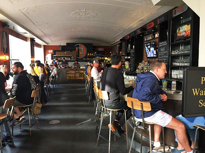 Happiness is a full bar! These lucky diners are living their best lives, proving that good food and good company are the secret ingredients to a perfect evening.