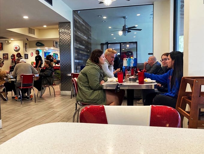 Breakfast club in session: A slice of Americana where strangers become friends over shared plates and steaming coffee.