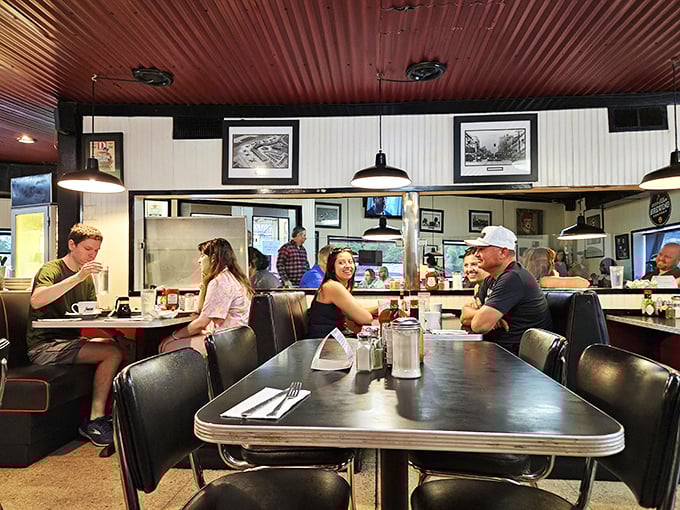 Where strangers become neighbors and neighbors become friends &ndash; the communal magic of diner culture captured in a single frame.