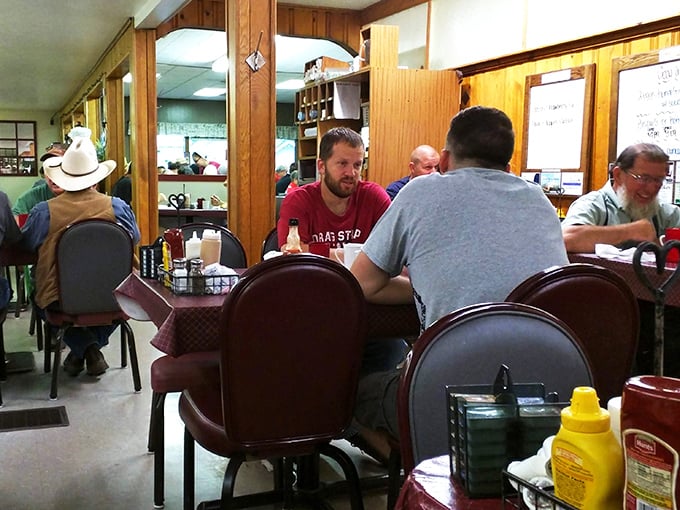 A cross-section of America gathered around tables where conversations flow as freely as the coffee, proving good food still brings people together.