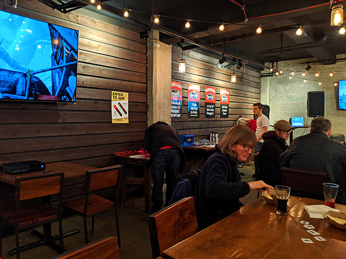 Happy diners in their natural habitat. Watch as they perform the sacred ritual of the barbecue feast.