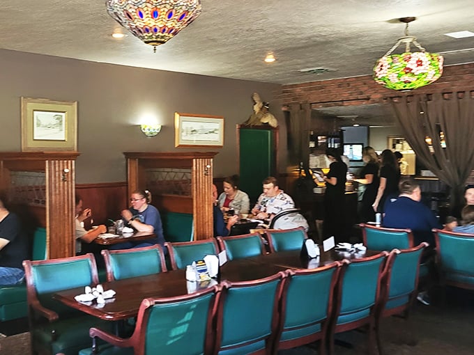 Happy diners, colorful lamps, and the buzz of conversation. It's like Norman Rockwell painted a steakhouse, but with better lighting.