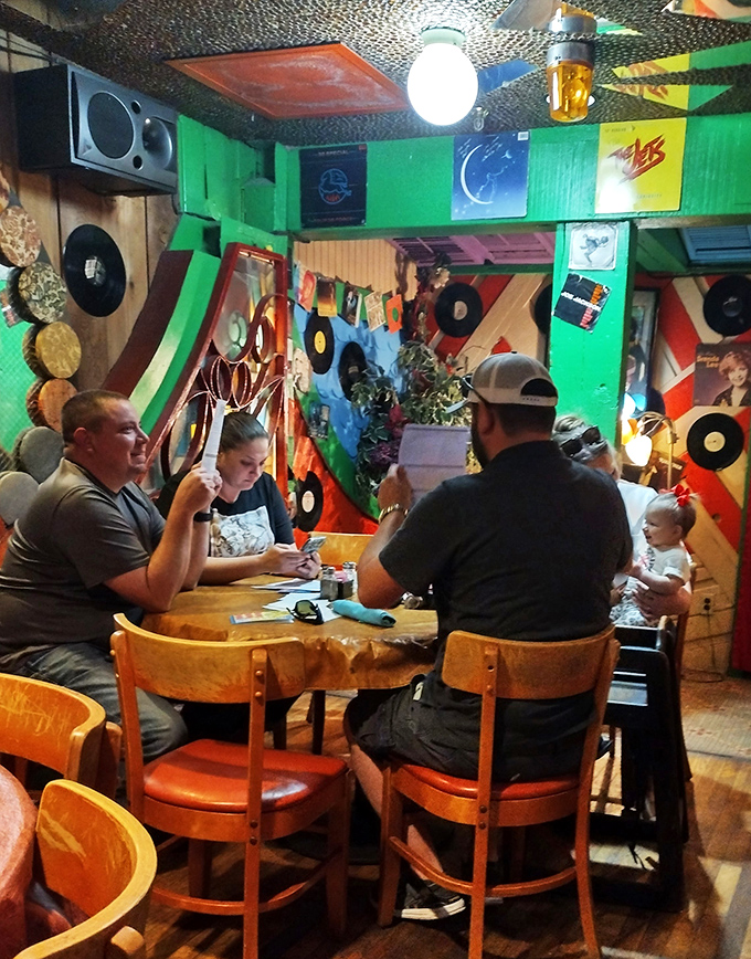Where else can you dine surrounded by vinyl records and neon? It's like eating in a jukebox from the future.