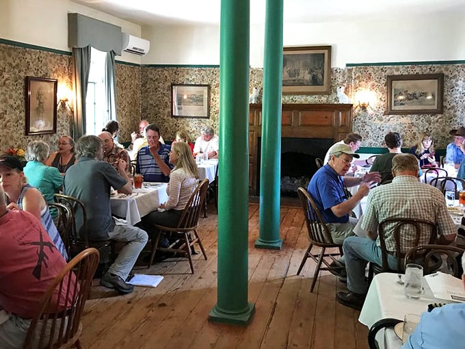 A room full of happy diners, all partaking in the timeless ritual of good food and even better company.