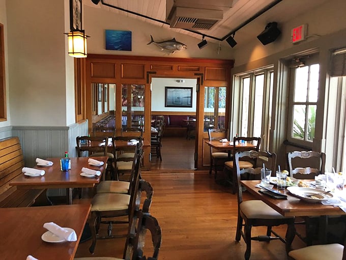 Nautical charm meets desert chic in this dining area. That mounted fish? He's totally judging your seafood choices, but in a friendly way.